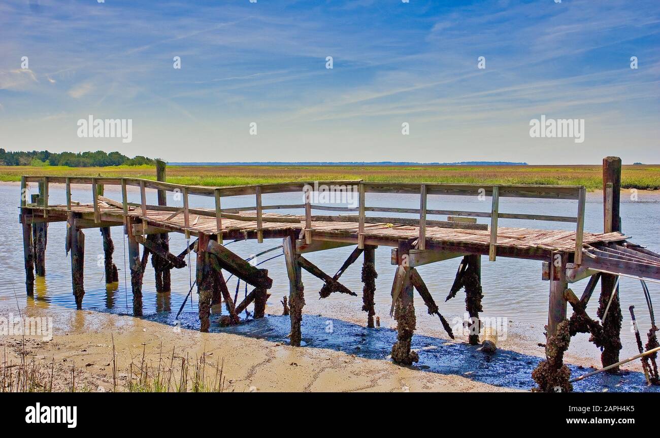 Old Pier in Disrepair Over Marsh Stock Photo - Alamy