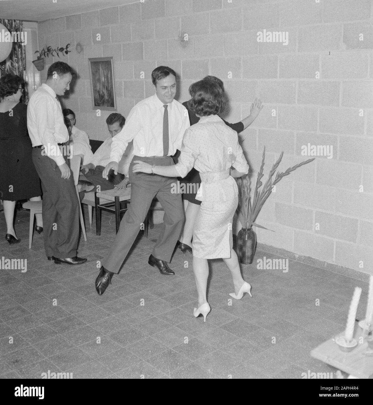 Hostess and guests Black and White Stock Photos & Images - Alamy