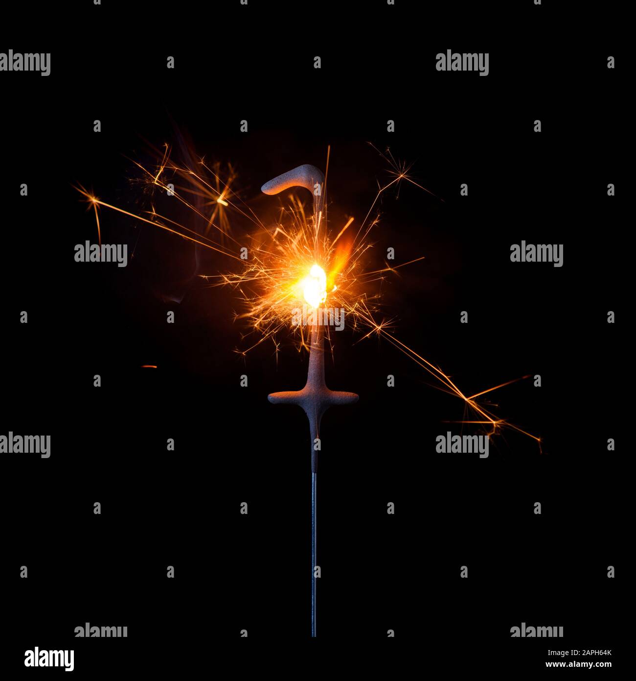 Burning sparkler in shape of number one, digit 1, isolated on black ...