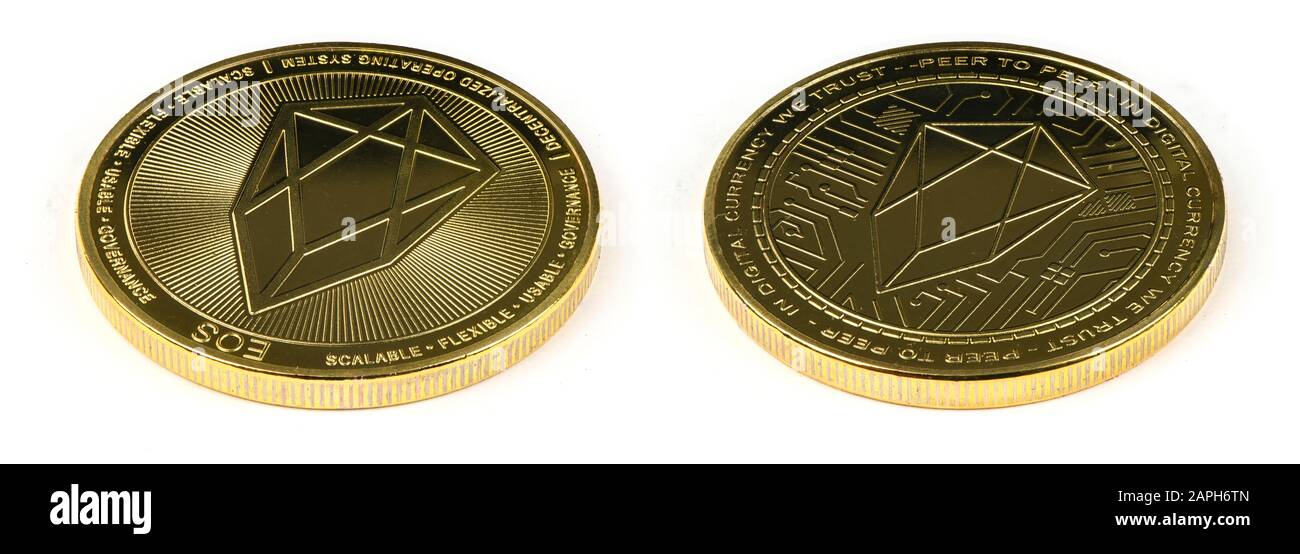 Face and back side of the crypto currency golden EOS isolated on white ...