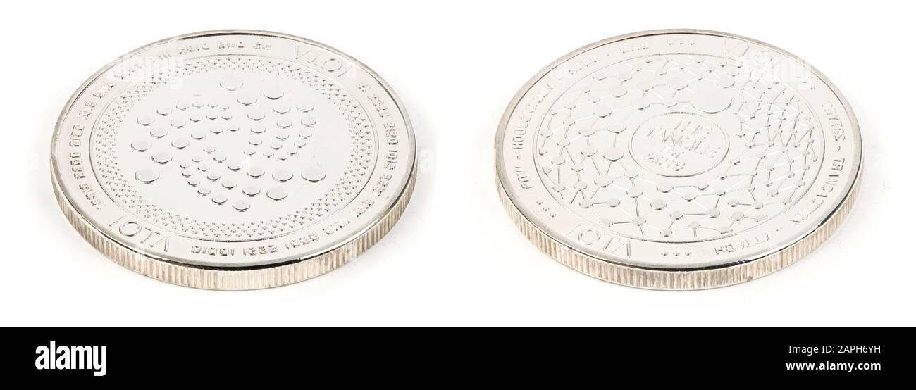 Face and back side of the crypto currency silver iota isolated on white ...