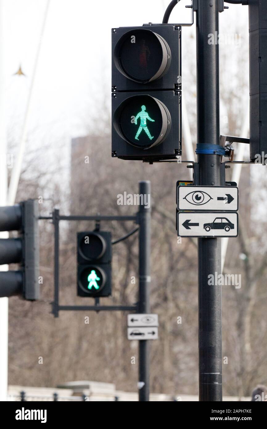 Close up of traffic safety pictograms on a pedestrian crossing near ...