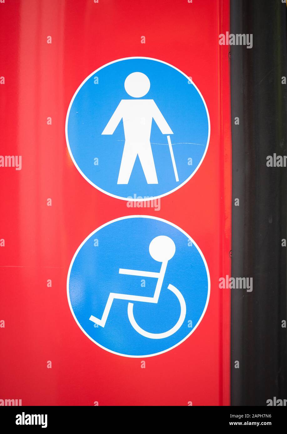 Accessibility signs on outside of a London bus Stock Photo - Alamy