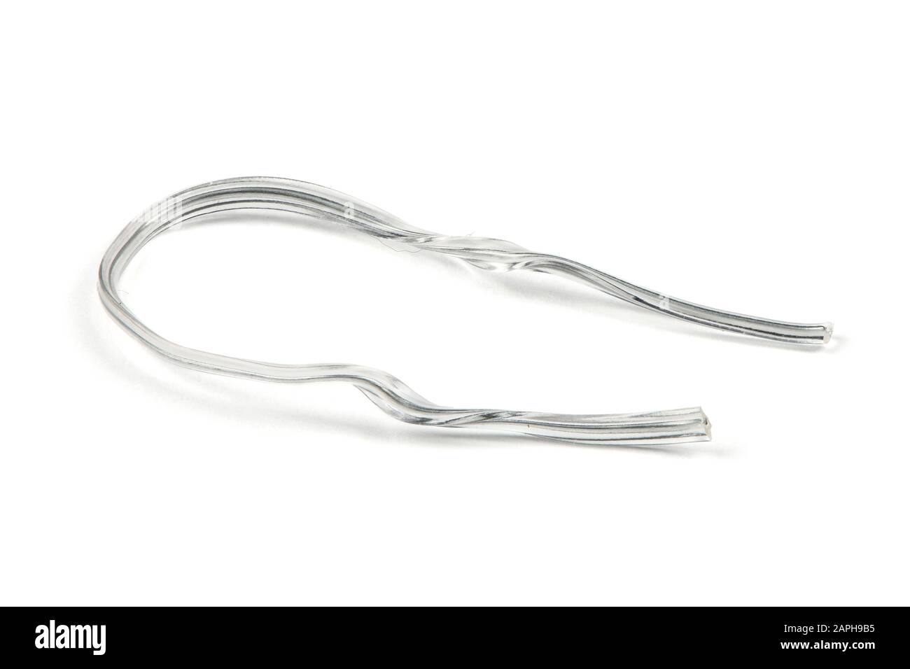 White plastic coated wire tie used for a variety of things on white ...