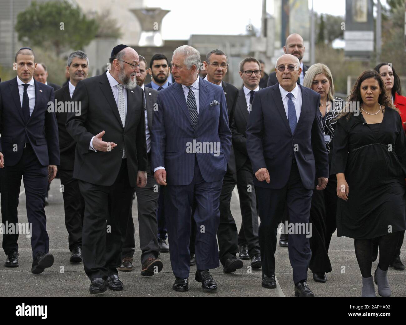 Jerusalem, Israel. 23rd Jan, 2020. Britain's Prince Charles (C) walks alongside British Chief ...