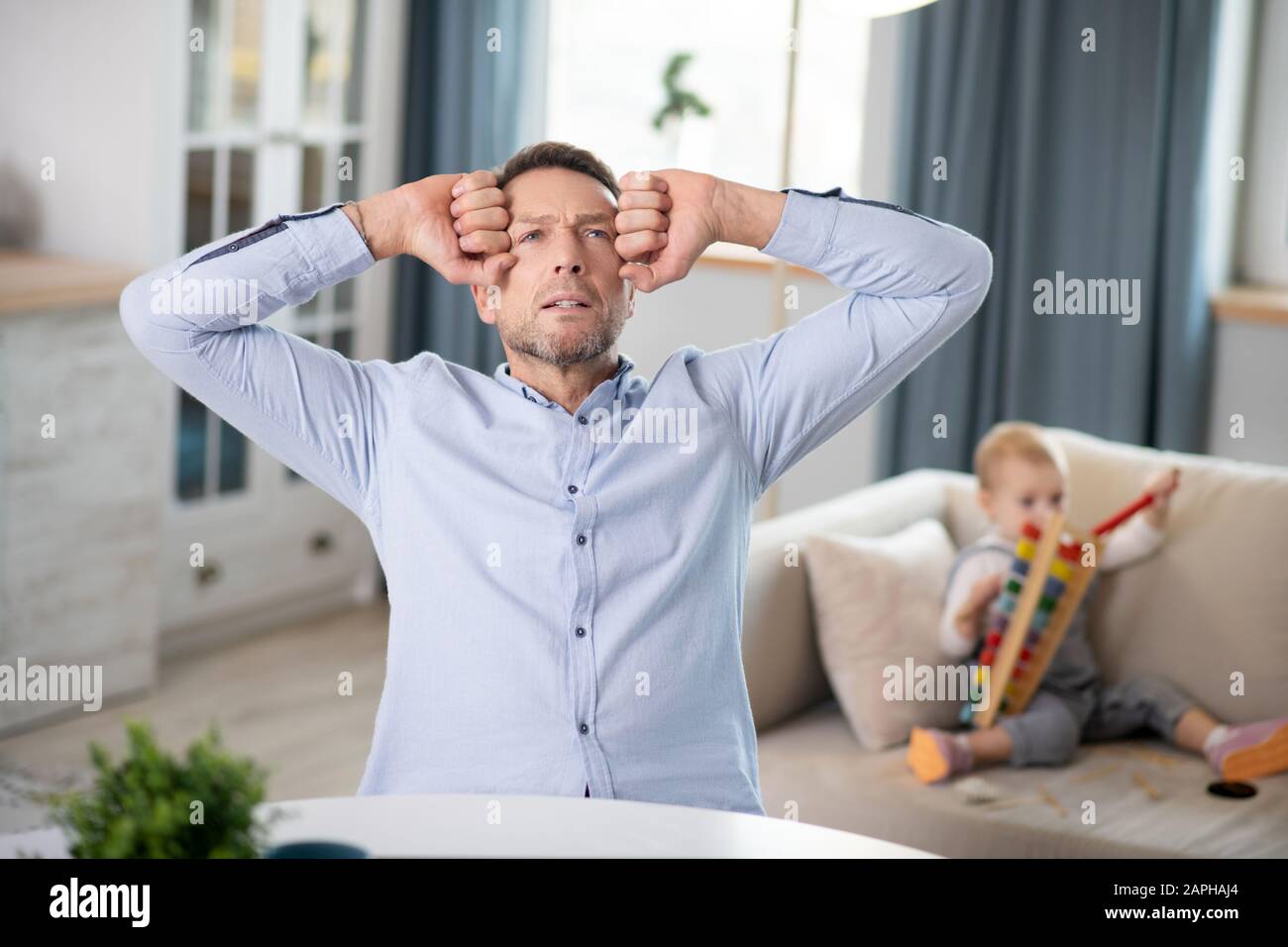 Tired father work hi-res stock photography and images - Alamy