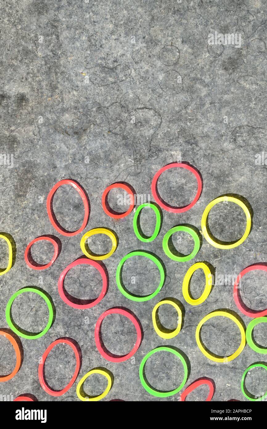 Colorful rubber bands. Rubber bands in black background. Vibrant ...