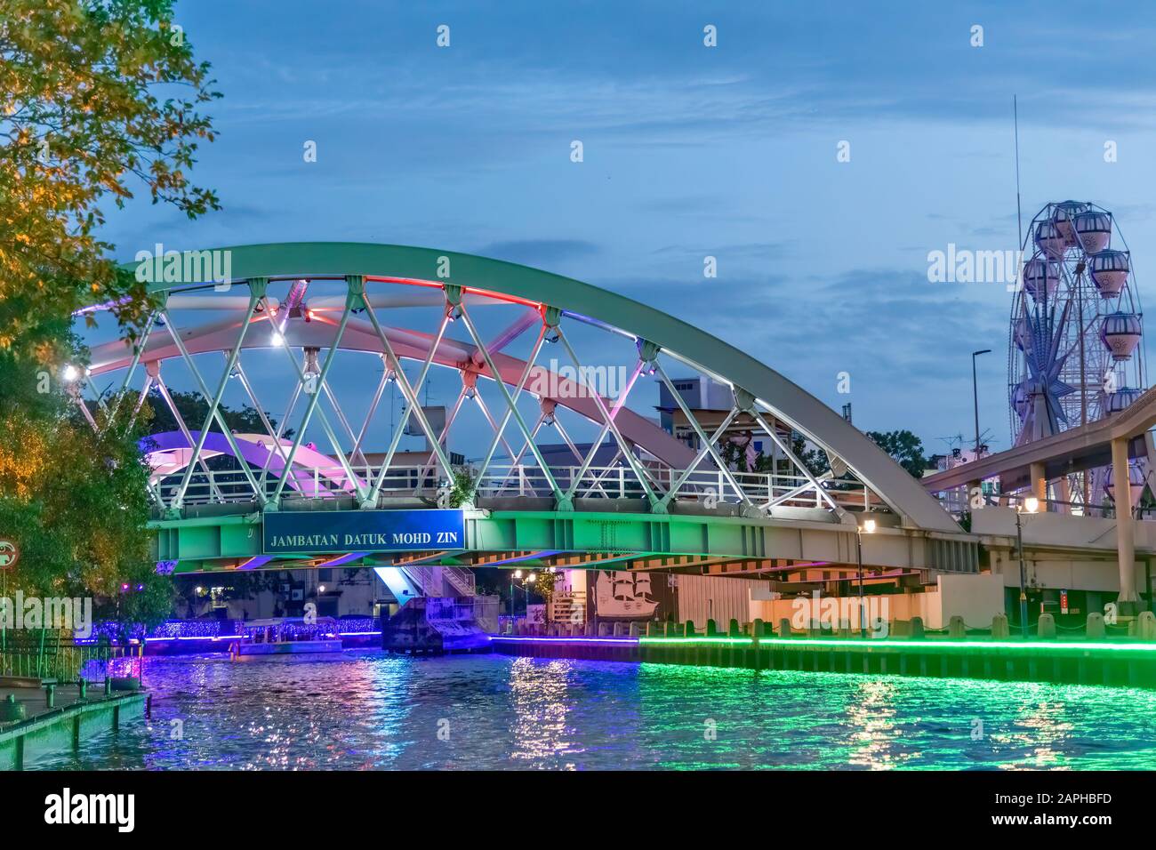 Sunset view of Melaka riverfront from a cruise boat. Malacca River and ...