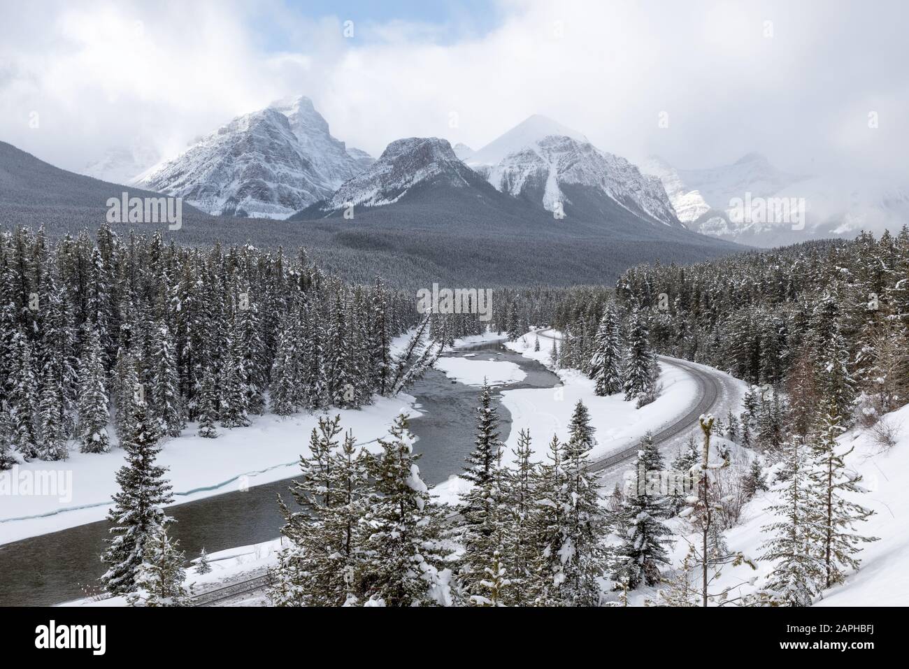 Winter view of Morant’s Curve on the railway though Banff National Park ...