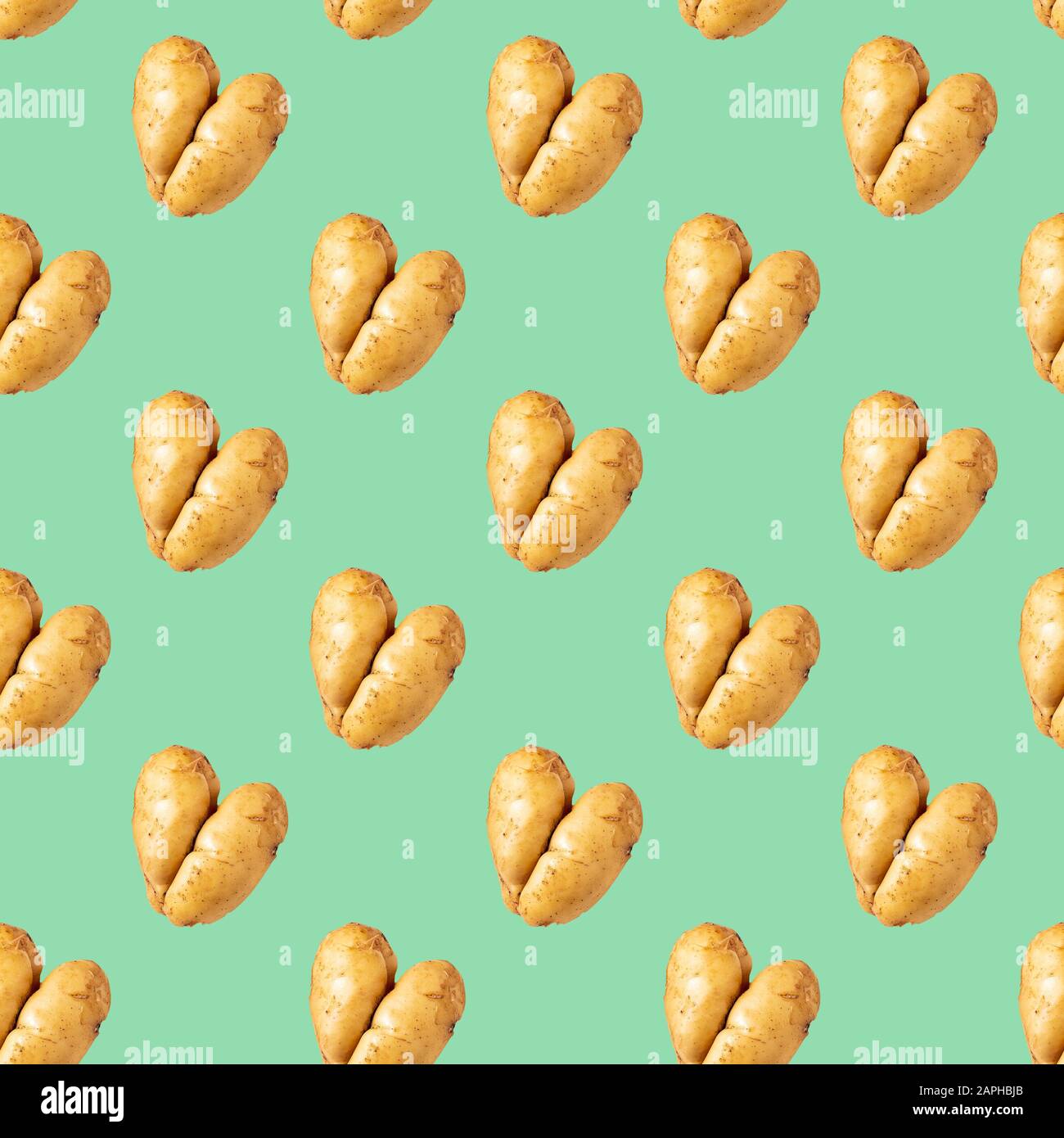 Seamless food pattern with ugly curved potato over neo mint background ...