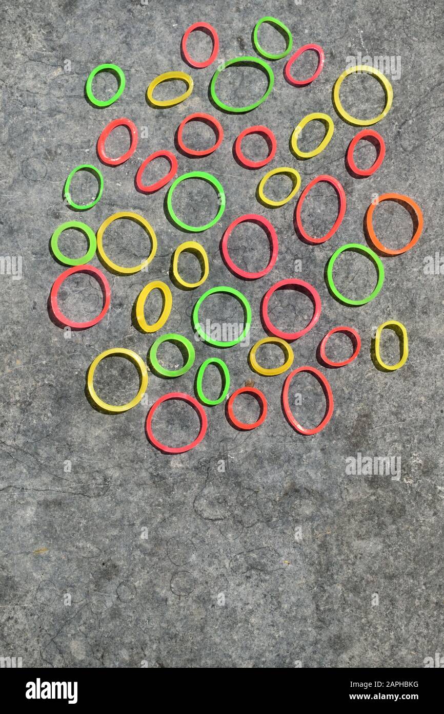 Colorful rubber bands. Rubber bands in black background. Vibrant ...