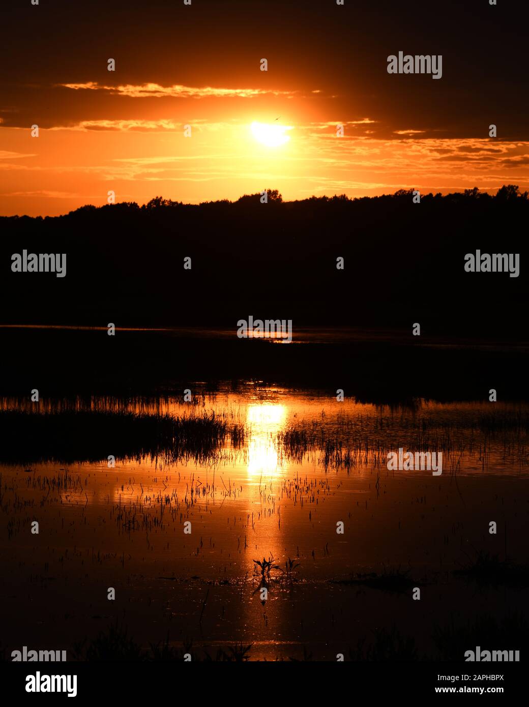 Sunset over water refuge hi-res stock photography and images - Alamy