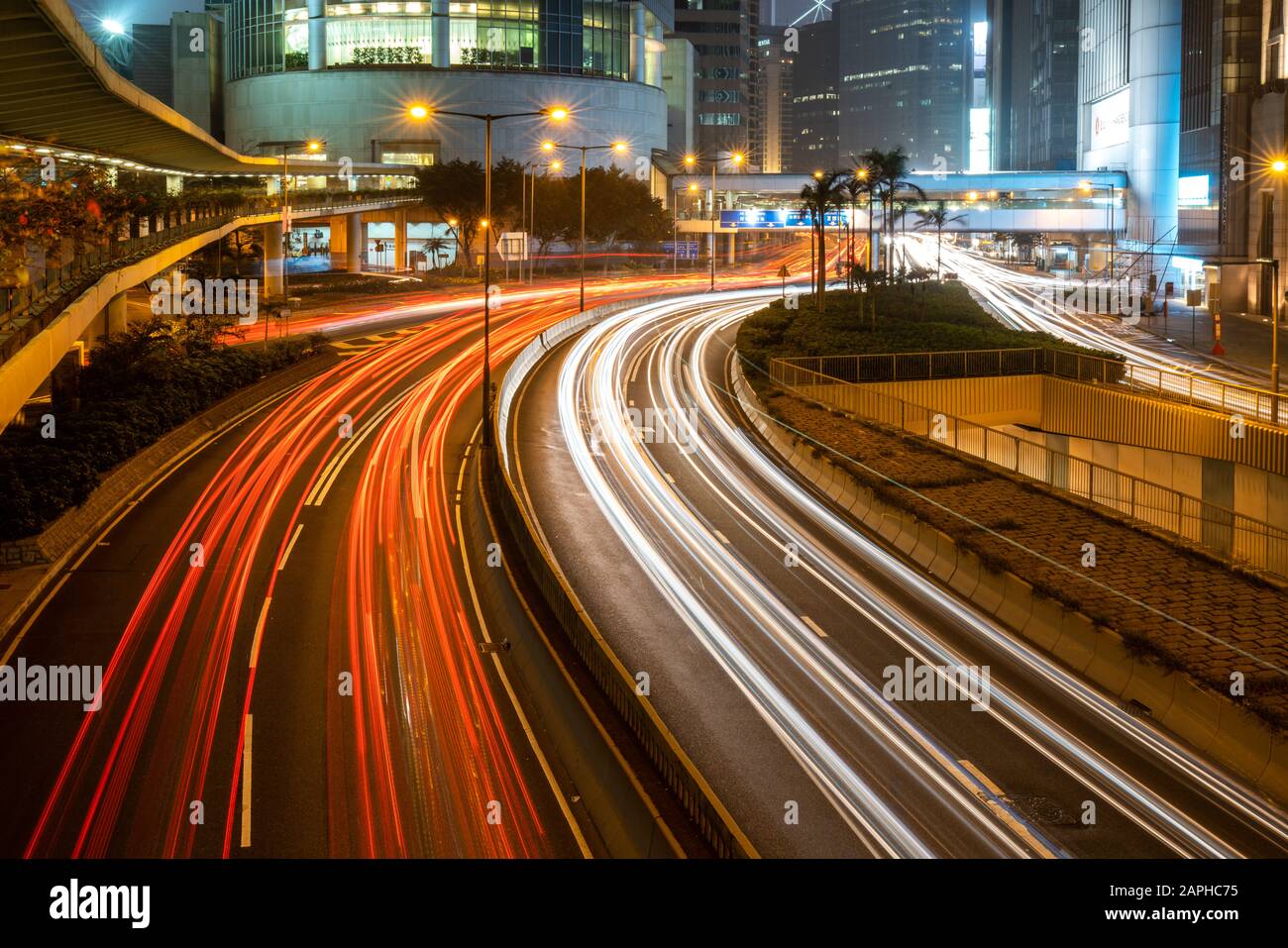 Car traffic light trail on city road Stock Photo - Alamy