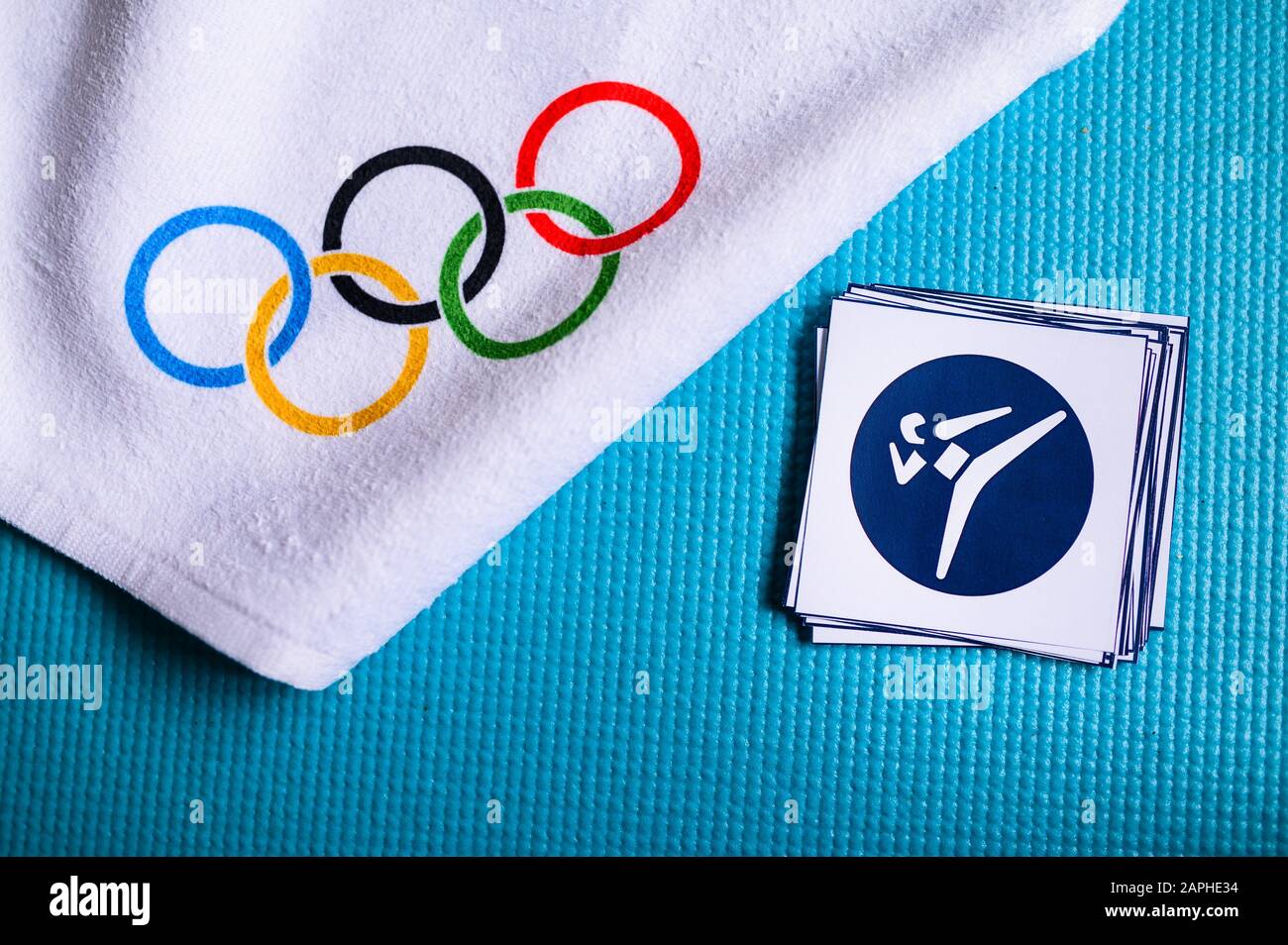 TOKYO, JAPAN, JANUARY. 20. 2020: Taekwondo pictogram and olympic rings ...