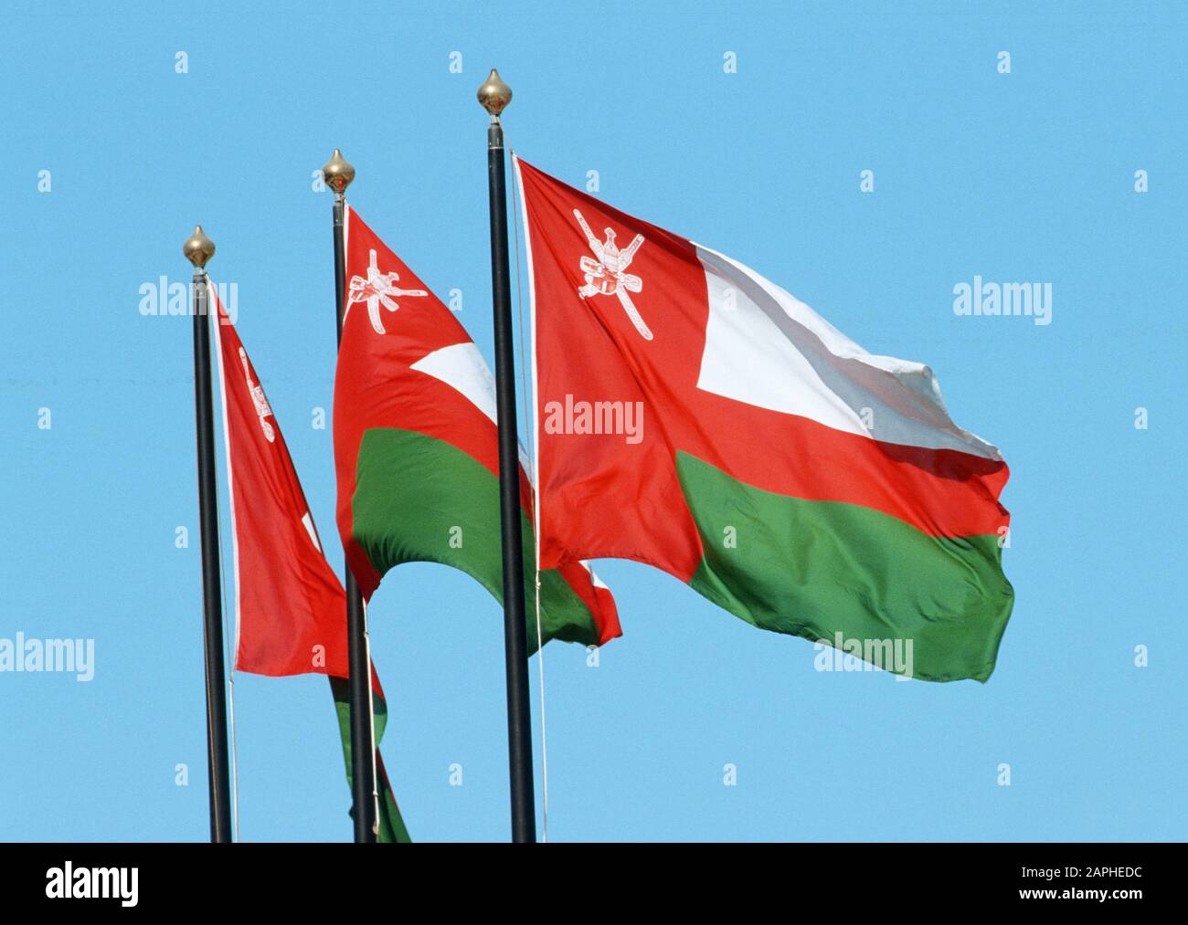 Flag of Oman flying over the capital, Muscat, Oman Stock Photo - Alamy
