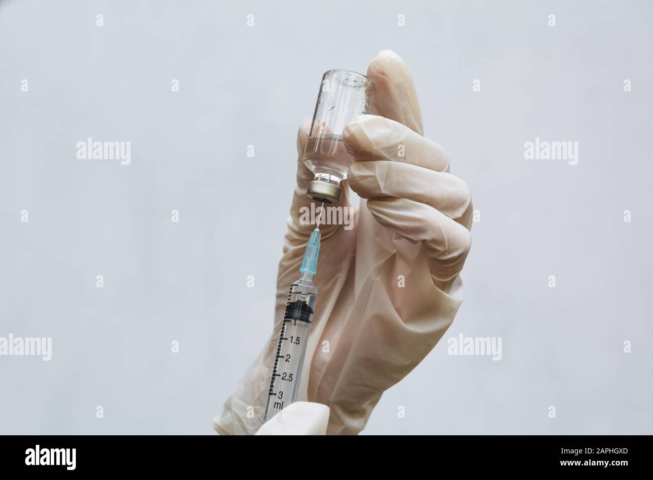 Hand of doctor holding syringe and drug, medical concept Stock Photo ...