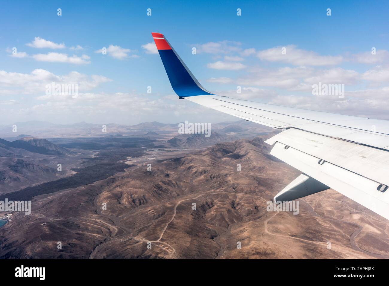 Canary Islands mountain landscape under airplane wing Stock Photo - Alamy