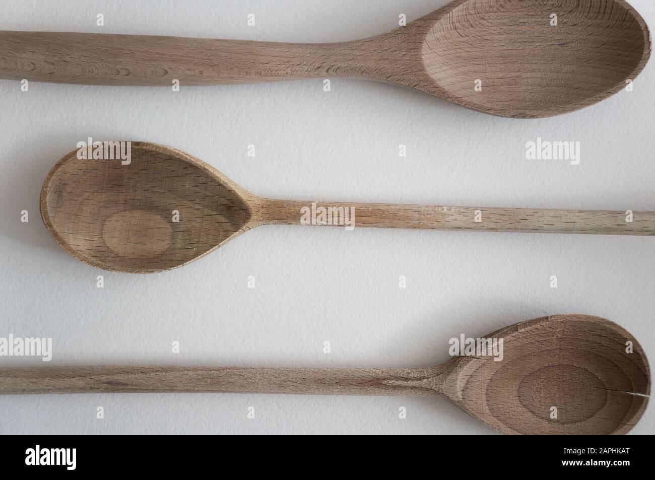 Brown wooden spoons laid out. Baking, cooking and kitchen concepts ...