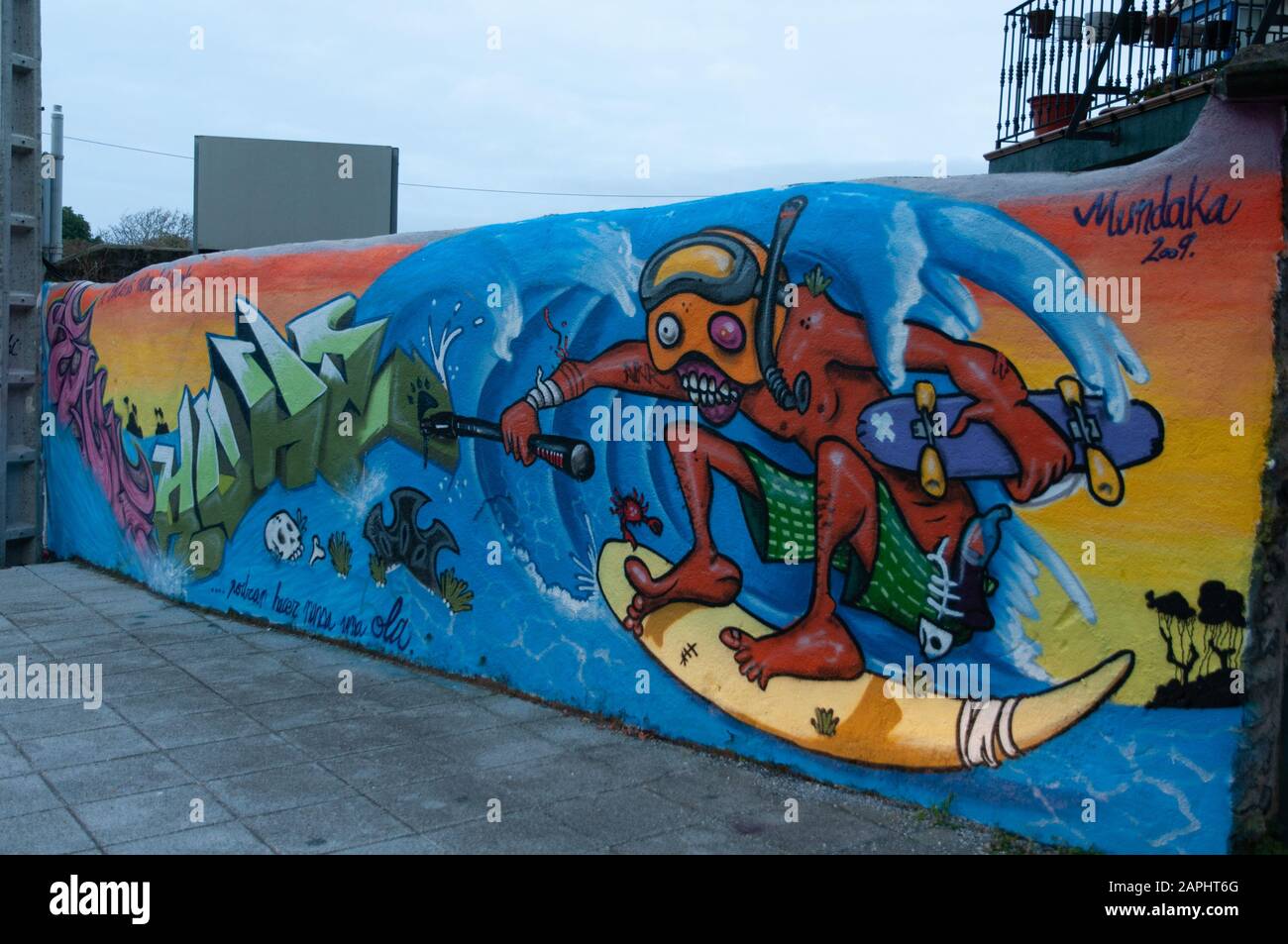 Colourful Graffiti Mural of a tribal surfer. Bilbao Stock Photo - Alamy
