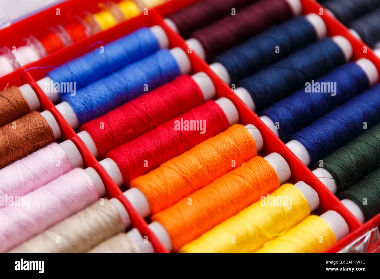 colorful sewing and tailoring tools and items on light background Stock ...