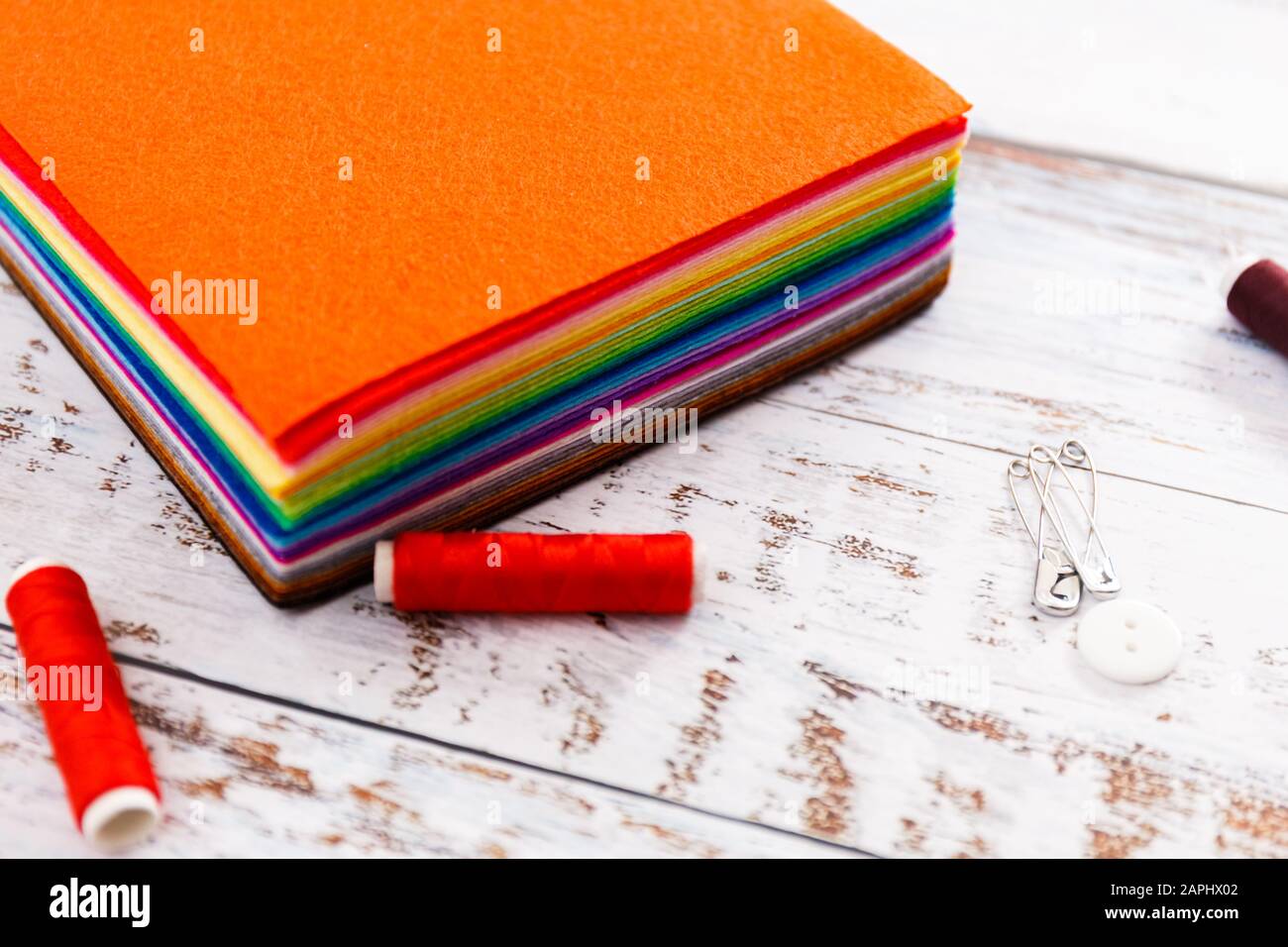 colorful sewing and tailoring tools and items on light background Stock ...