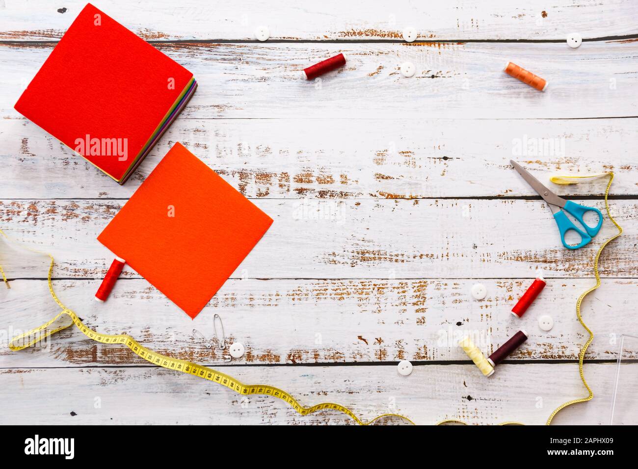 colorful sewing and tailoring tools and items on light background Stock ...