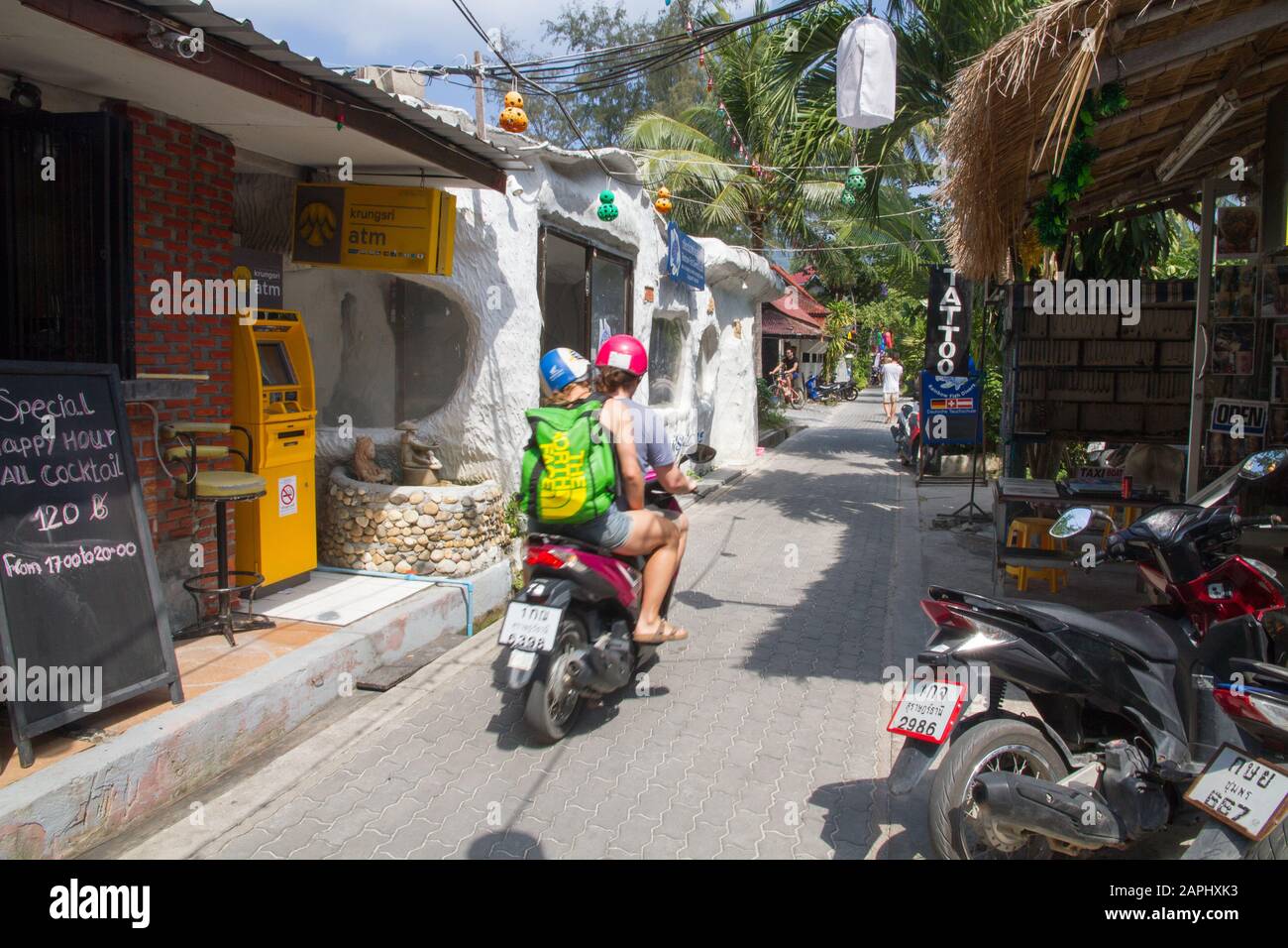 Thailand, Koh Tao island, tourist with motor bike in street Stock Photo - Alamy