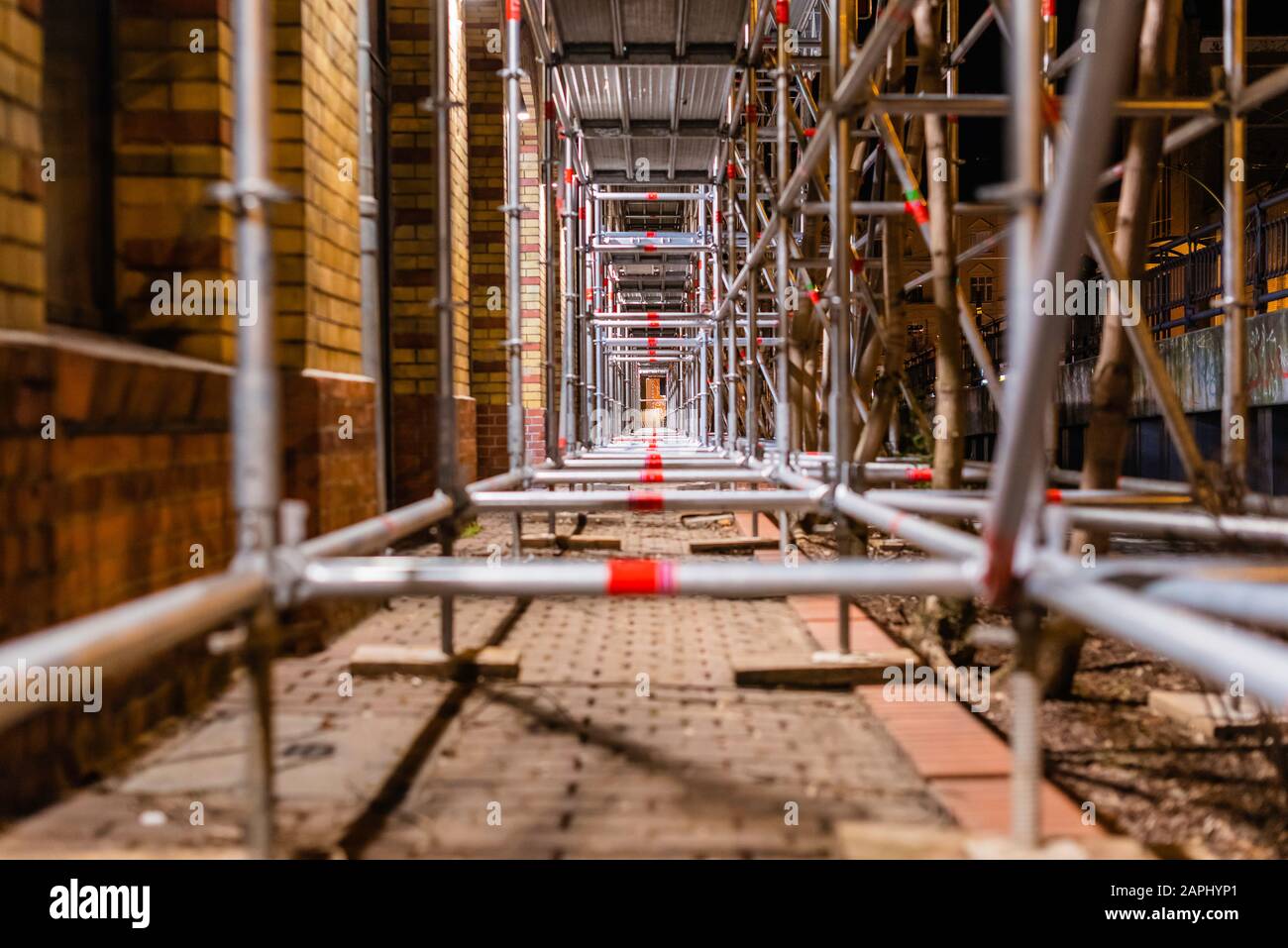 illuminated scaffolding at night, steel, abstract, no workers, nice ...