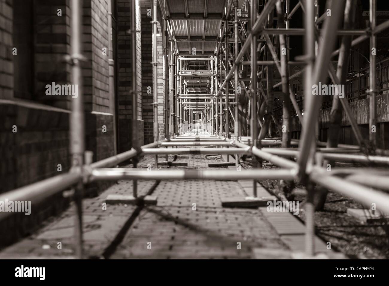 illuminated scaffolding at night, steel, abstract, no workers, nice ...