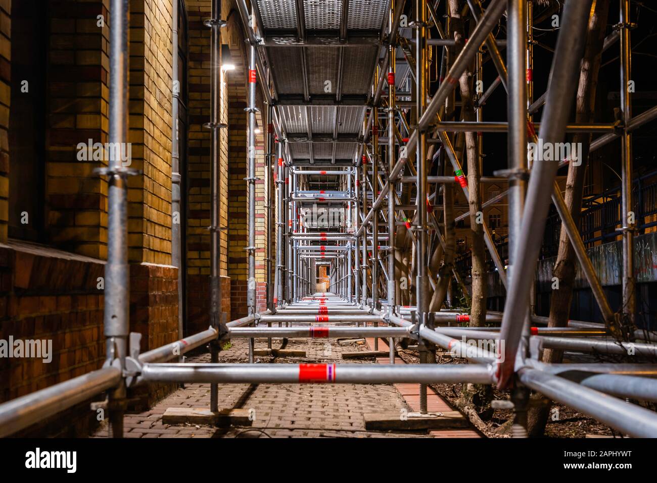 illuminated scaffolding at night, steel, abstract, no workers, nice ...