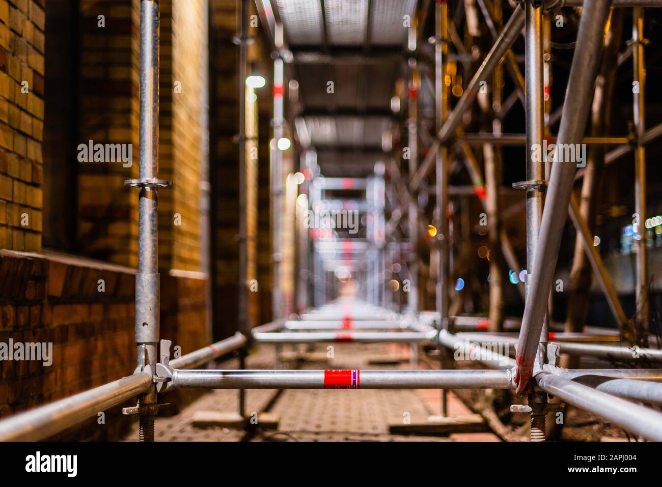 illuminated scaffolding at night, steel, abstract, no workers, nice ...