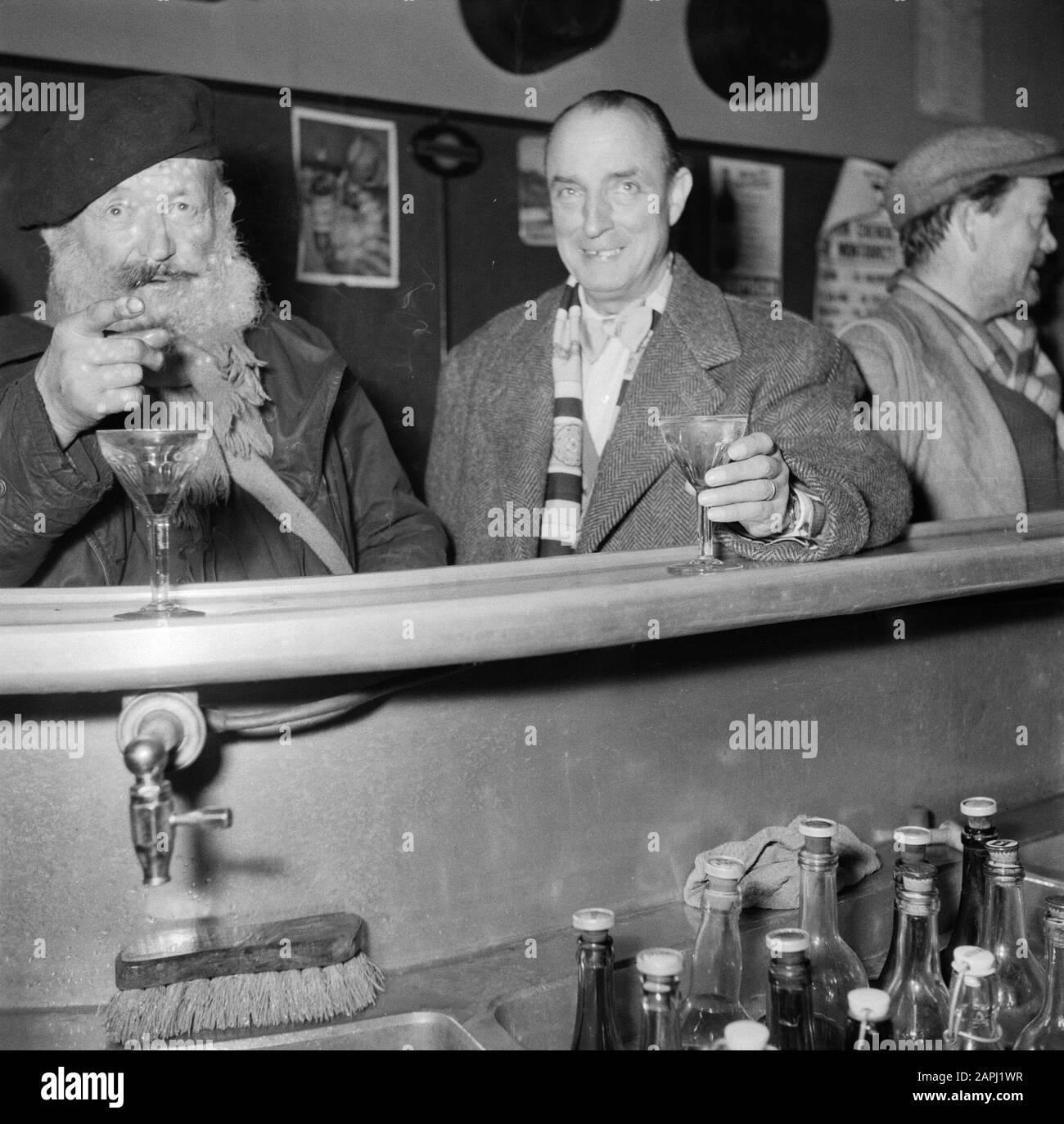 Two men visit a cafe Description: The two men drinking at the bar Date ...
