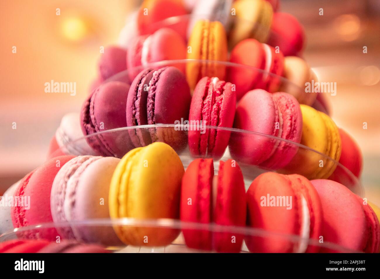 Colored red macaroon France pastry desserts on store counter Stock ...