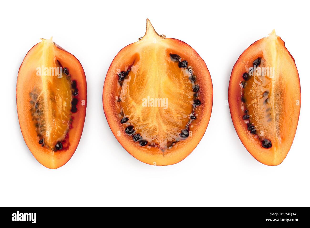 Fresh tamarillo fruit slices with leaves isolated on white background ...