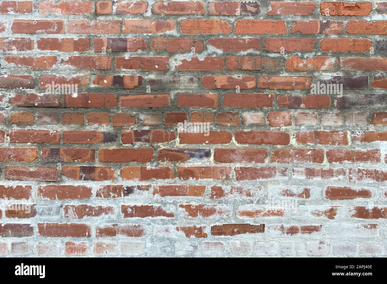 an old white washed red brick wall in an alley Stock Photo - Alamy