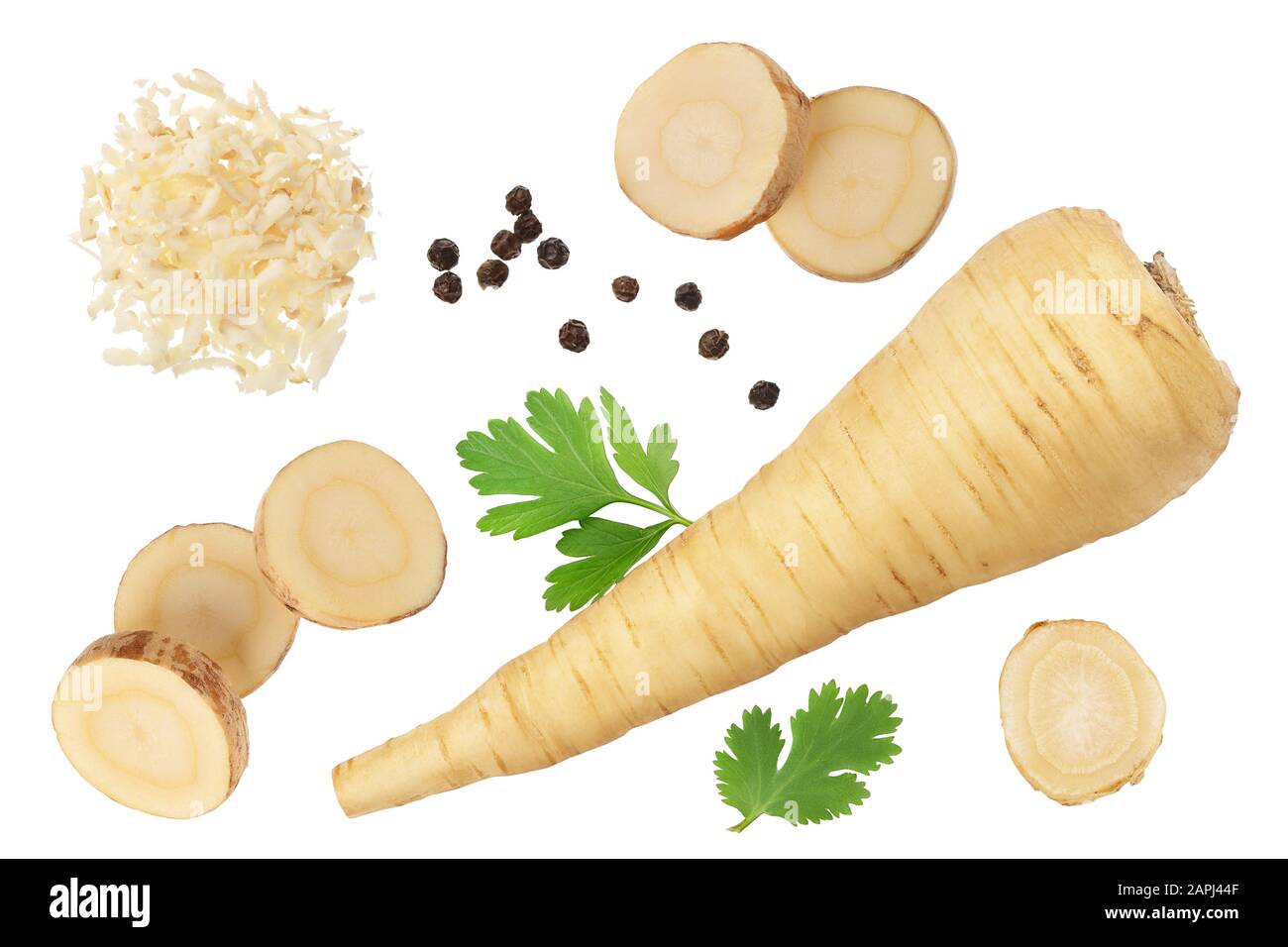 Parsnip root and slices with parsley isolated on white background with ...