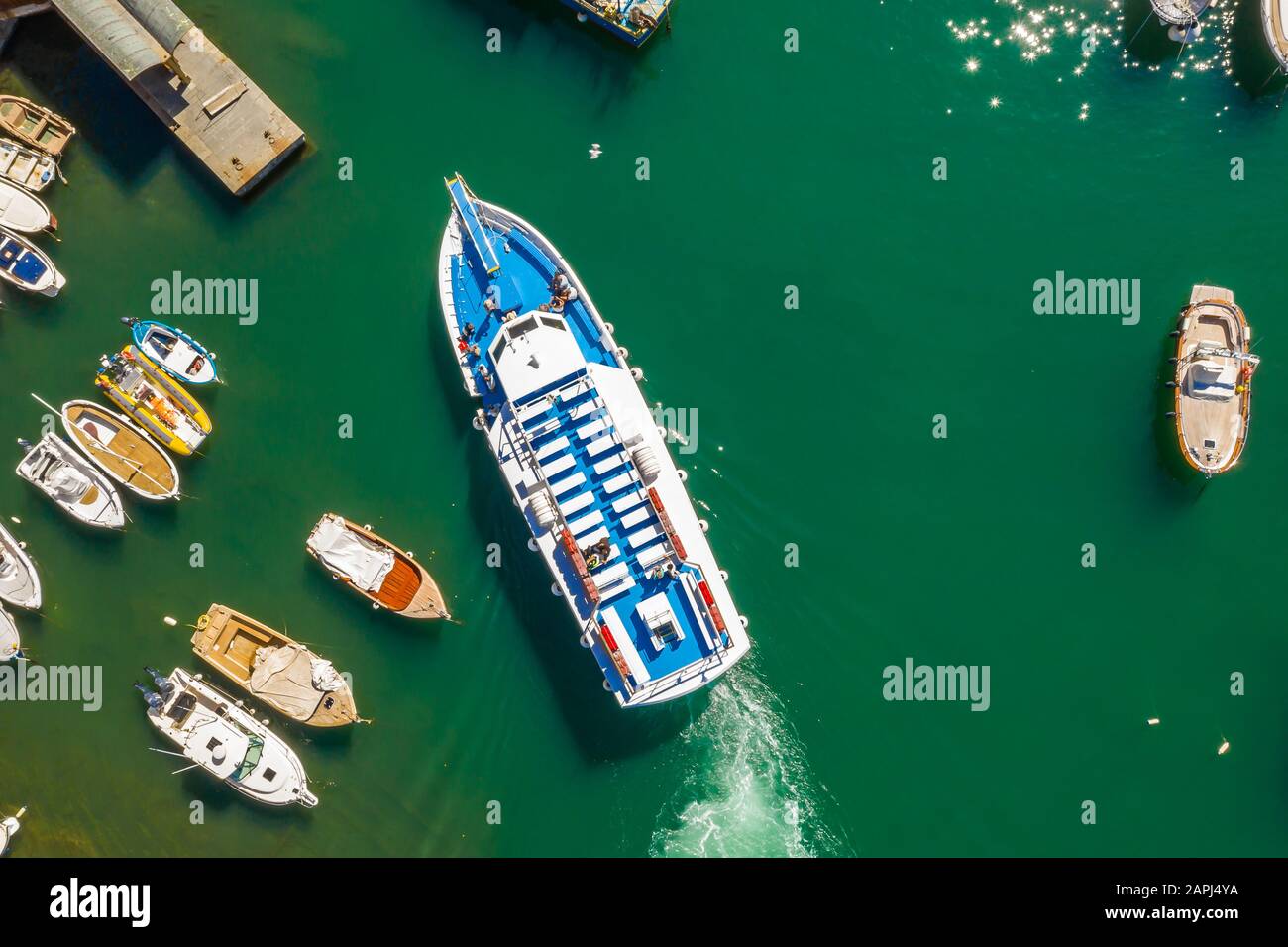 Cruise ship at harbor. Aerial view of beautiful yacht and boats in ...