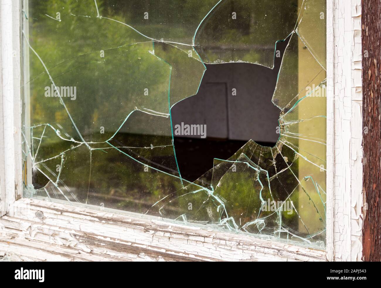 Burglary broken window Stock Photo - Alamy