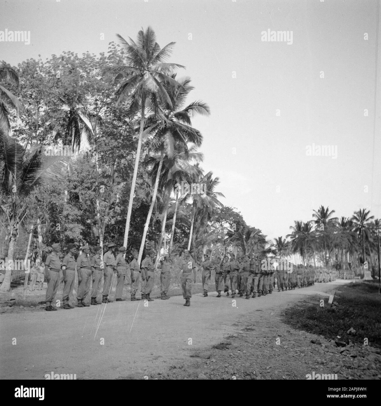 War volunteers in Malacca and Indonesia Description: Defilé at camp ...