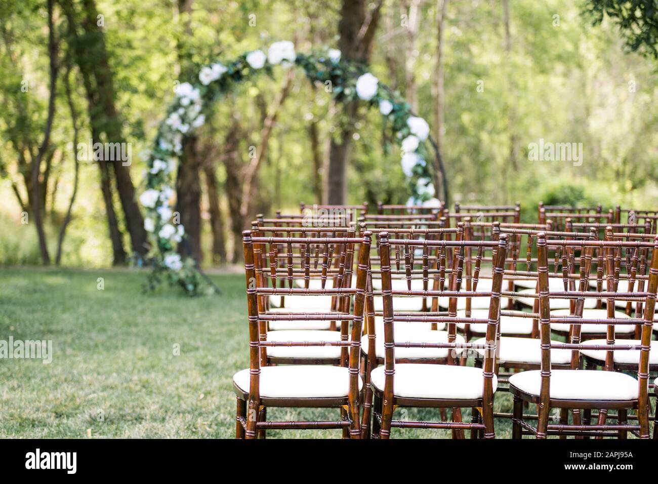 White chairs aisle outdoor wedding setup hi-res stock photography and ...