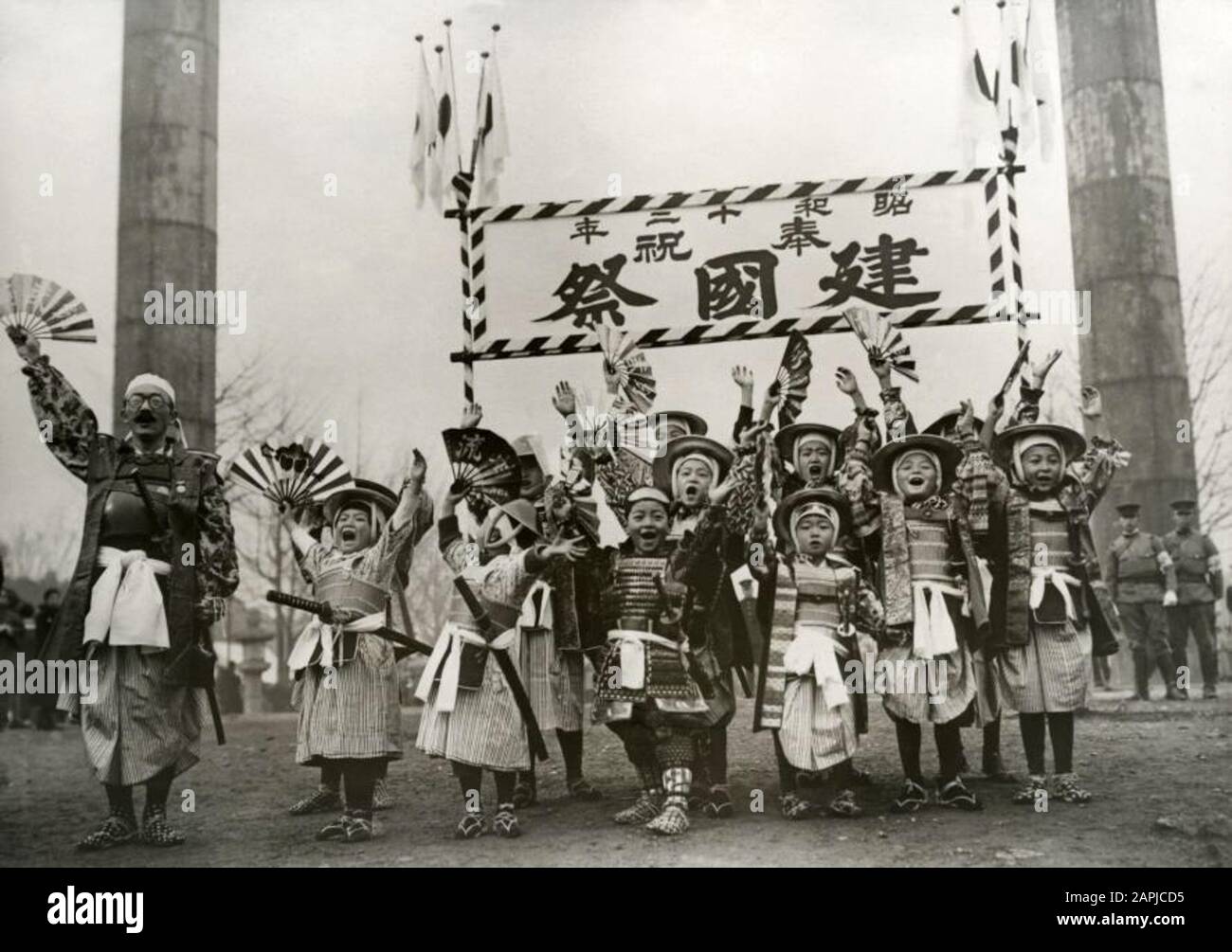 Japanese children, dressed in historical warrior garments, shout three ...