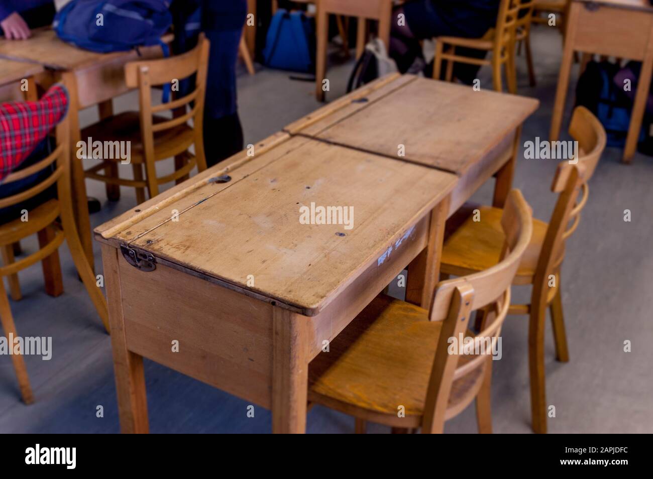 Desks in classroom Stock Photo - Alamy