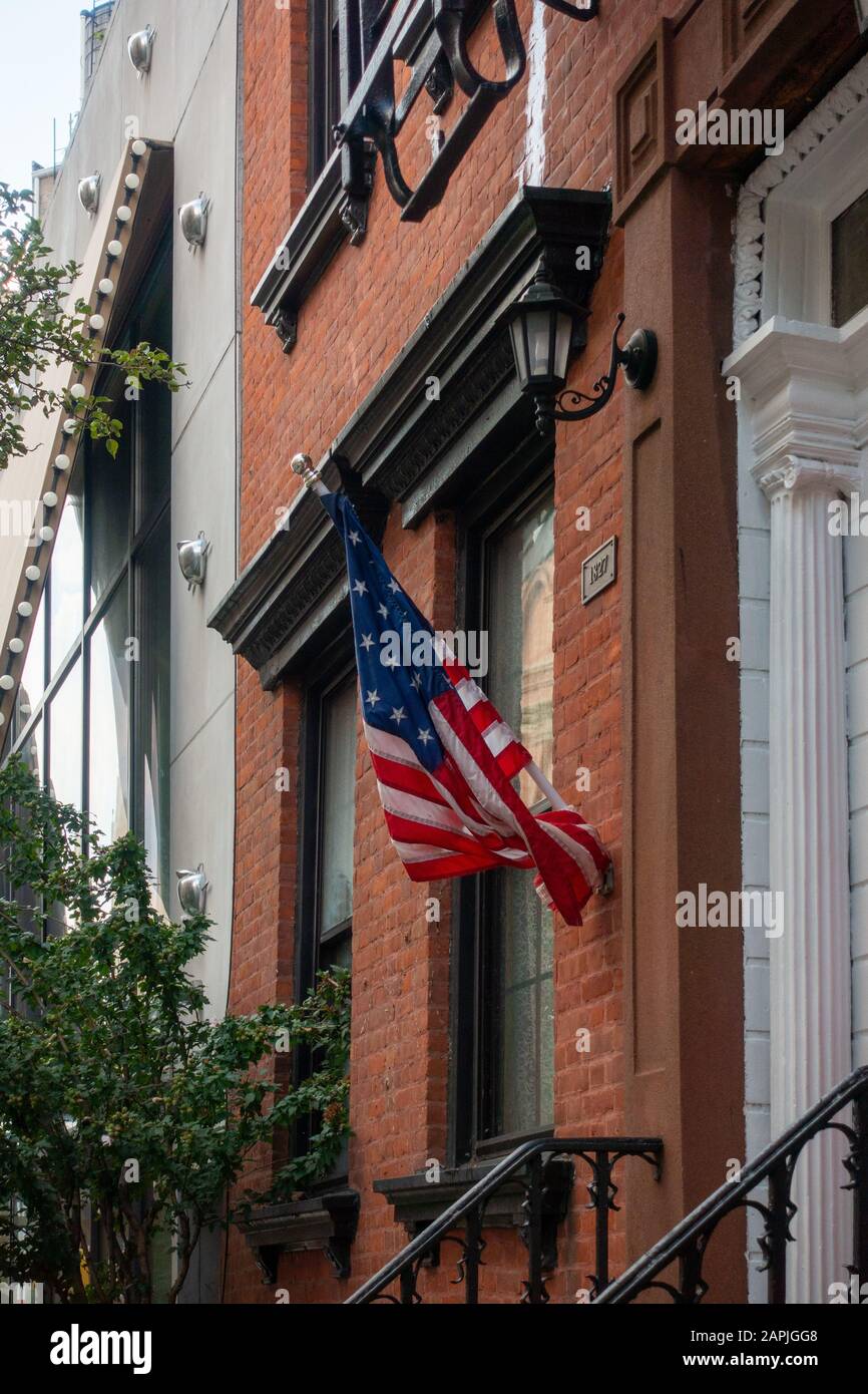 National American flag on building entrance Stock Photo - Alamy