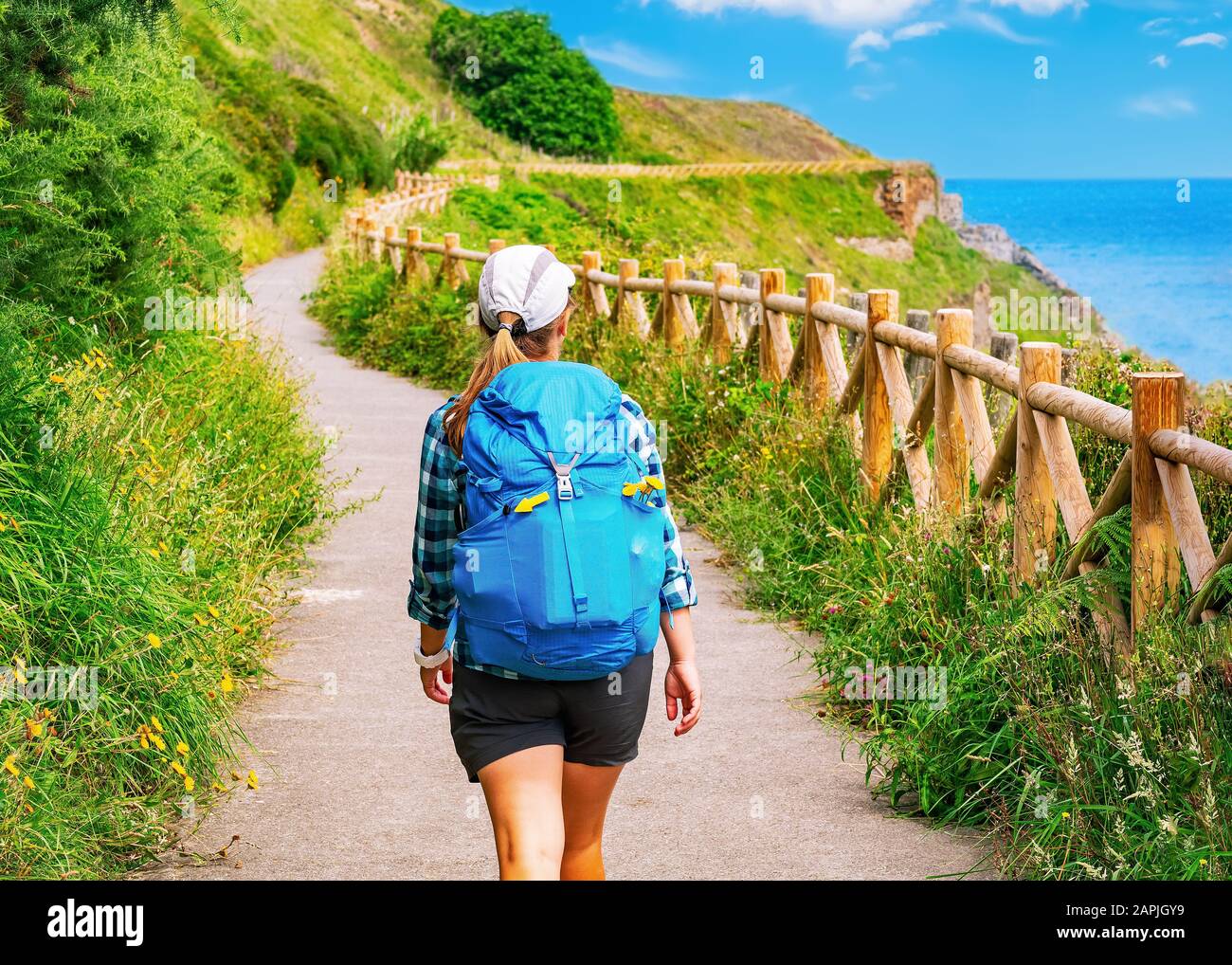 Lonely Pilgrim with backpack walking the Camino de Santiago in Spain ...