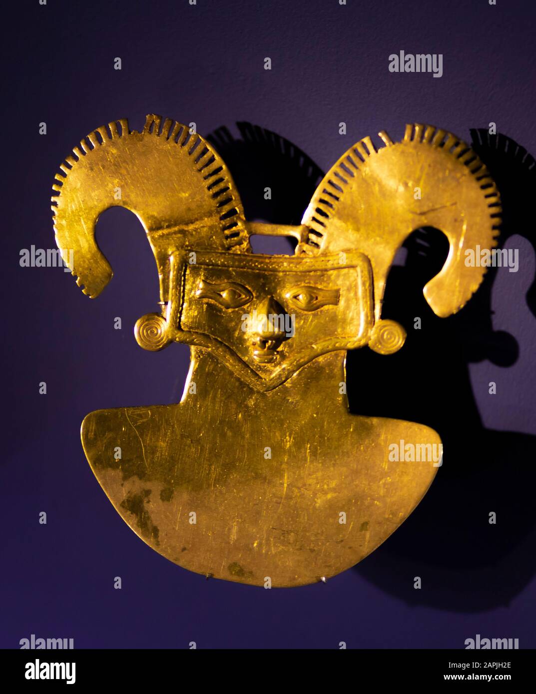 Golden indigenous ornament from South America natives (the Museo del ...