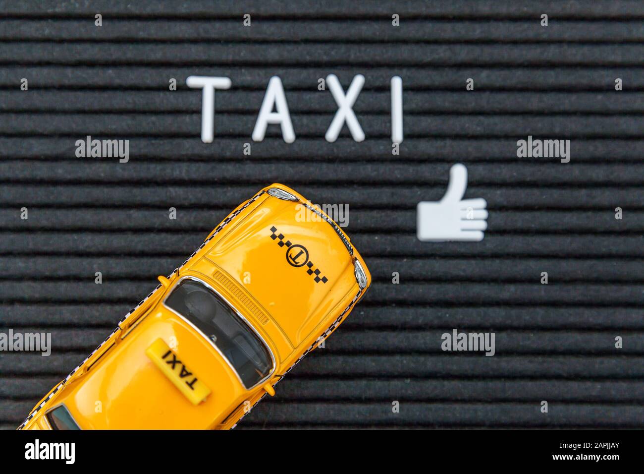 Simply design yellow toy car Taxi Cab model with inscription TAXI ...