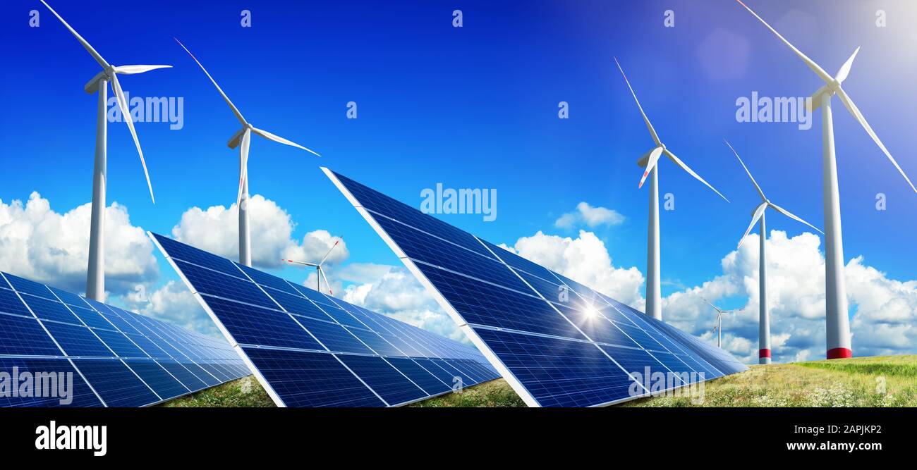 Solar panels and wind turbines on open field, with nice blue sky, white ...