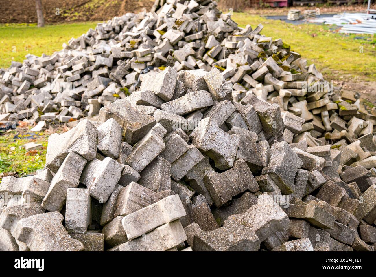 Piles of bone stones along the road for construction Stock Photo - Alamy