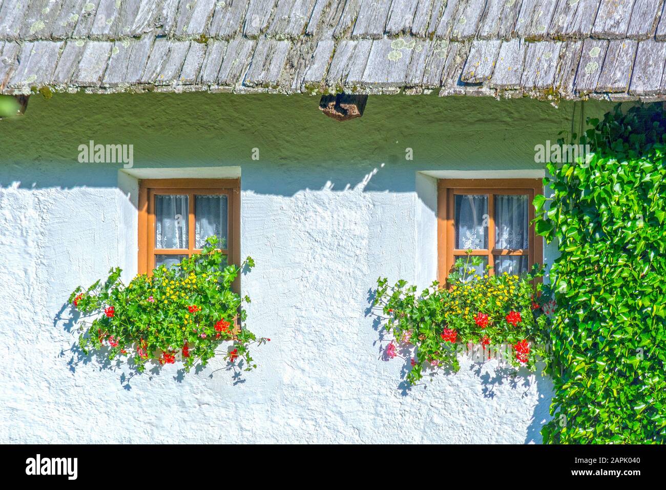 Windows of rural mountain house in Alps (Italy Stock Photo - Alamy
