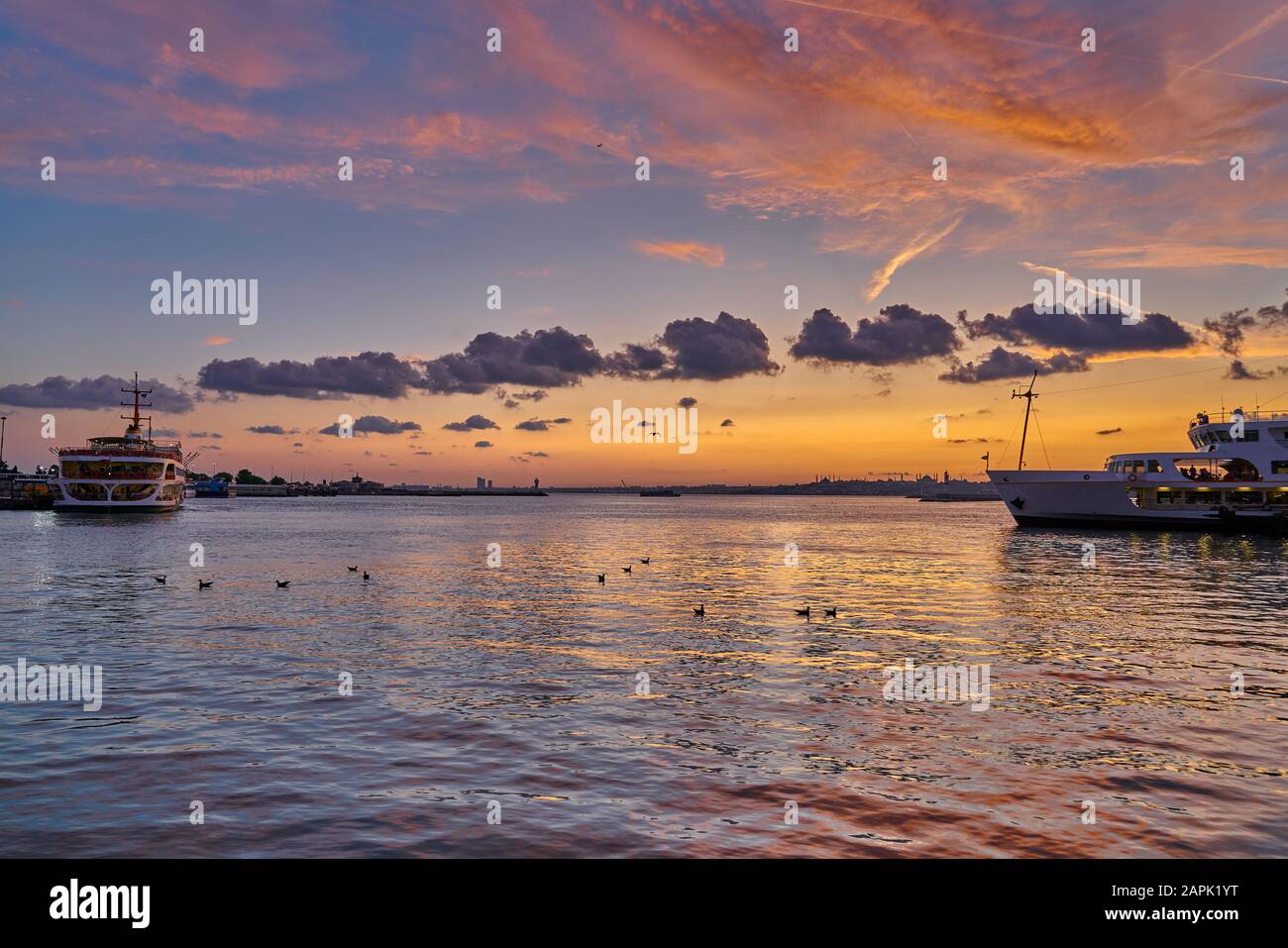 Beautiful sunset in Istanbul, Turkey. Sun is above silhouettes of Hagia ...